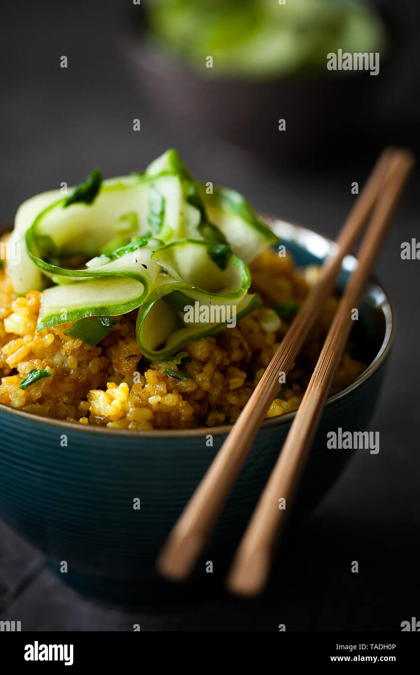 Traditional Burmese or Myanmar fried rice with shallots, turmeric and ...