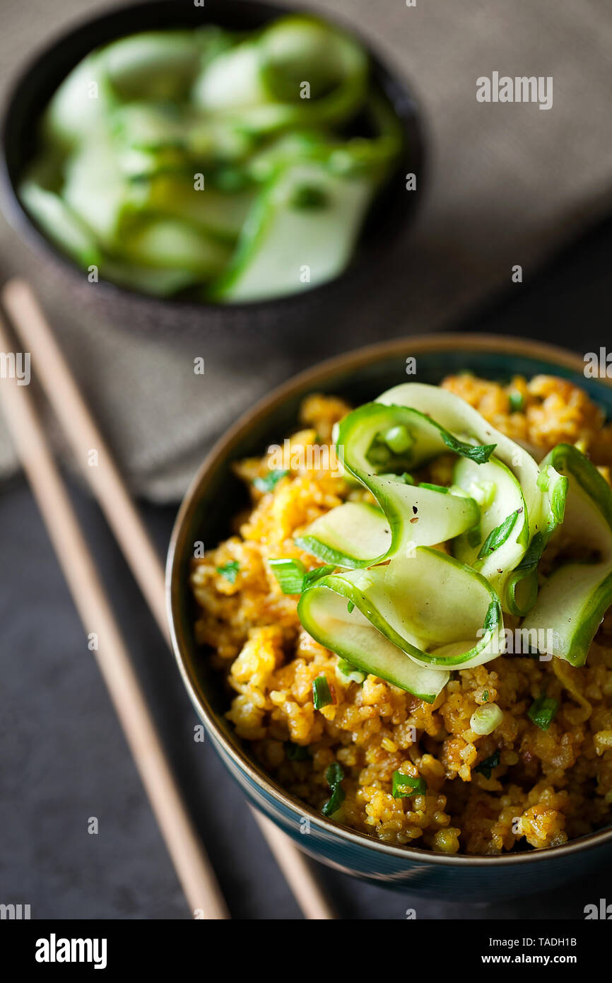 Traditional Burmese fried rice with shallots, turmeric and fresh ...