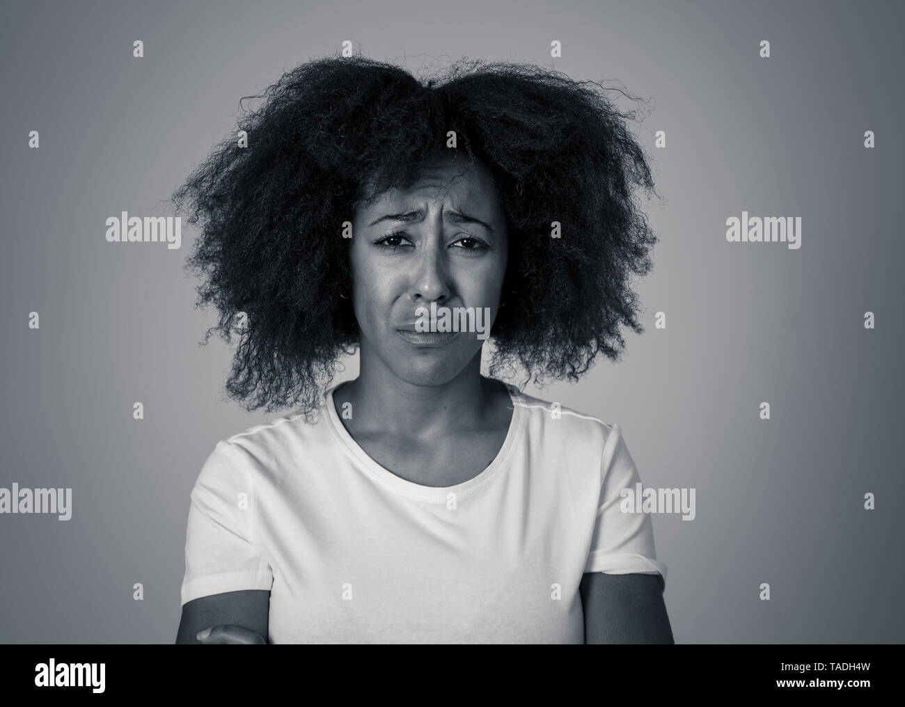 Portrait of african american woman in pain with sad and exhausted face ...