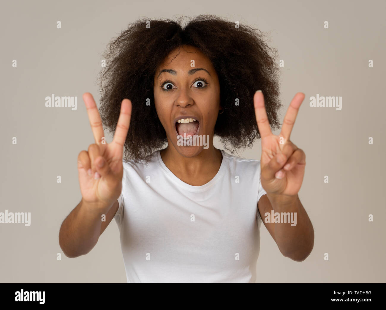 Portrait of attractive, confident african american young woman with ...