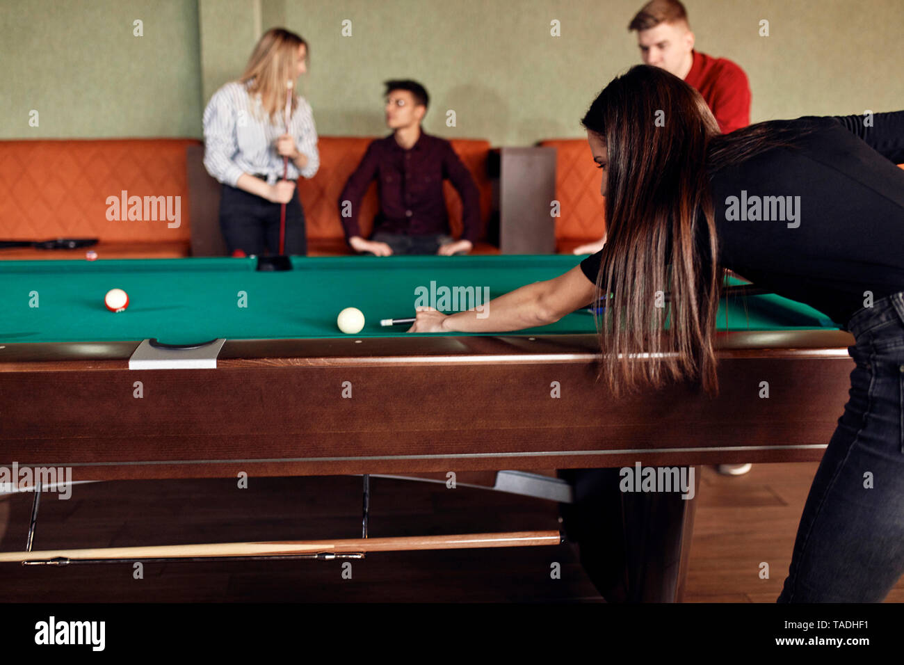 Young man bending over table hi-res stock photography and images - Alamy