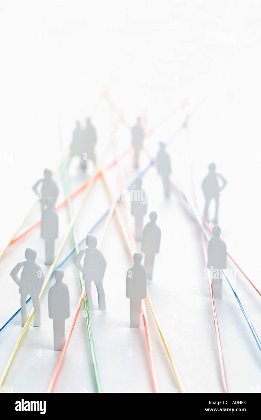 White figurines and colorful Stock Photo - Alamy