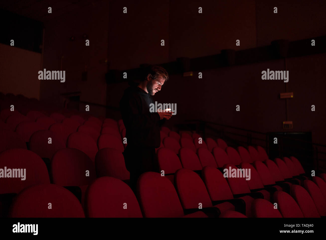 Director standing at Stock Photo - Alamy
