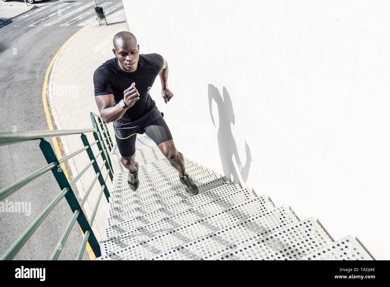 Bald man running hi-res stock photography and images - Alamy