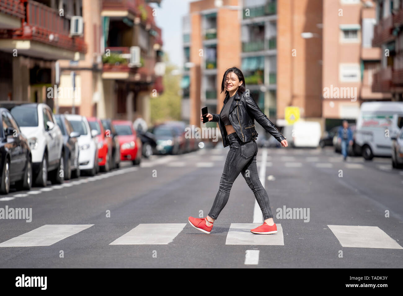 Mobile walking pedestrian crossing hi-res stock photography and images ...
