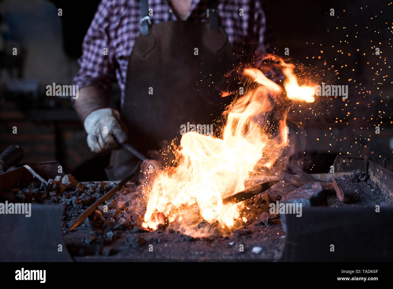People blacksmith forge working hi-res stock photography and images - Alamy