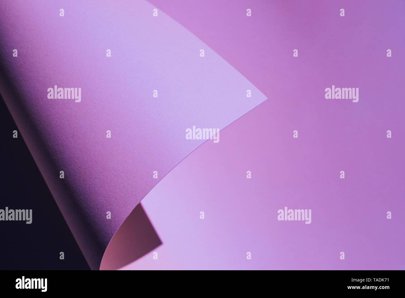 Purple folded paper as background Stock Photo - Alamy