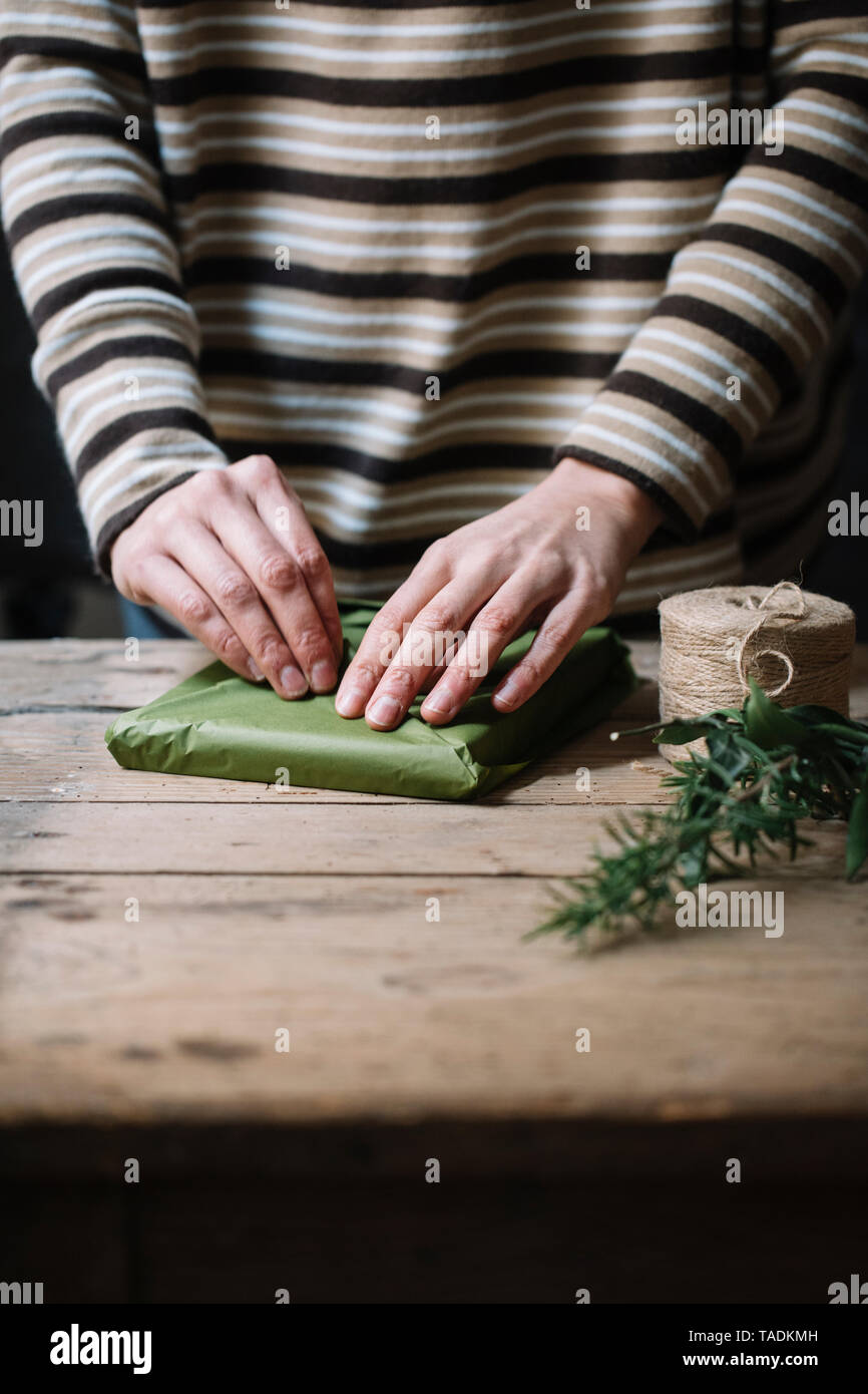 Person wrapping present hi-res stock photography and images - Alamy
