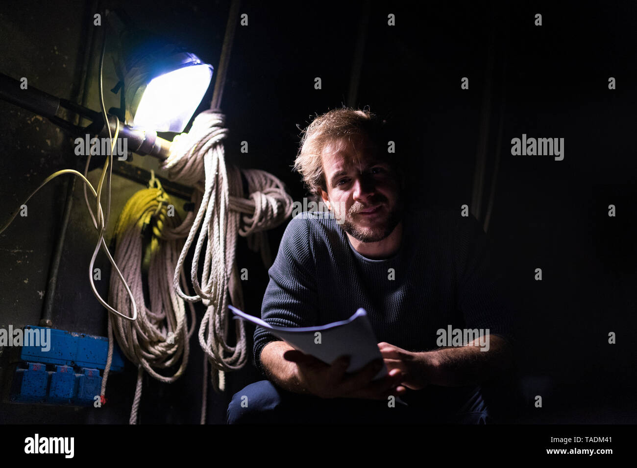 Portrait of actor with script backstage Stock Photo - Alamy