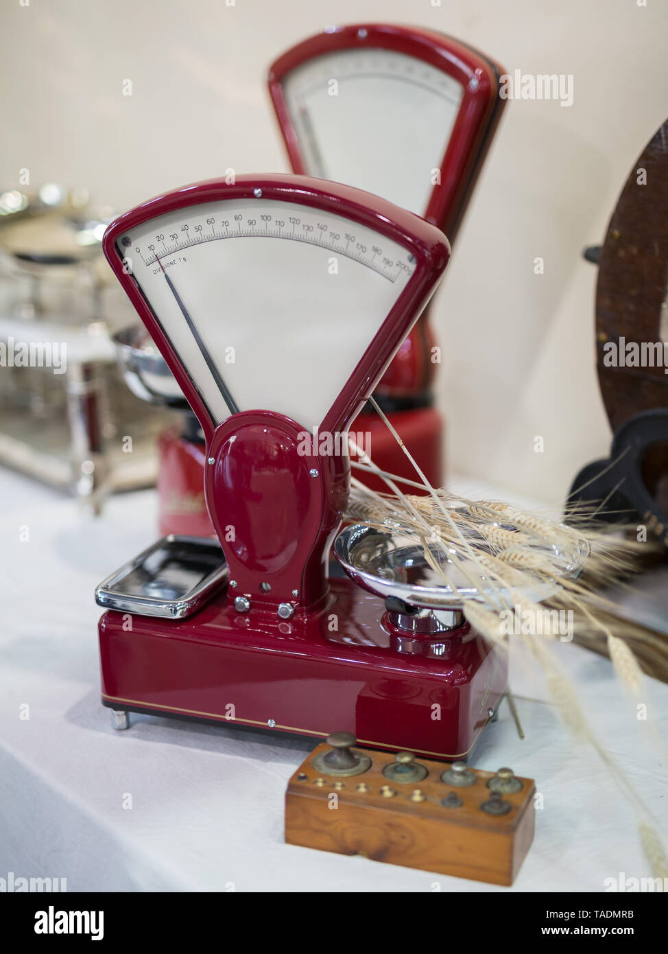 Ancient Red Scale for Food on White Table Stock Photo - Alamy