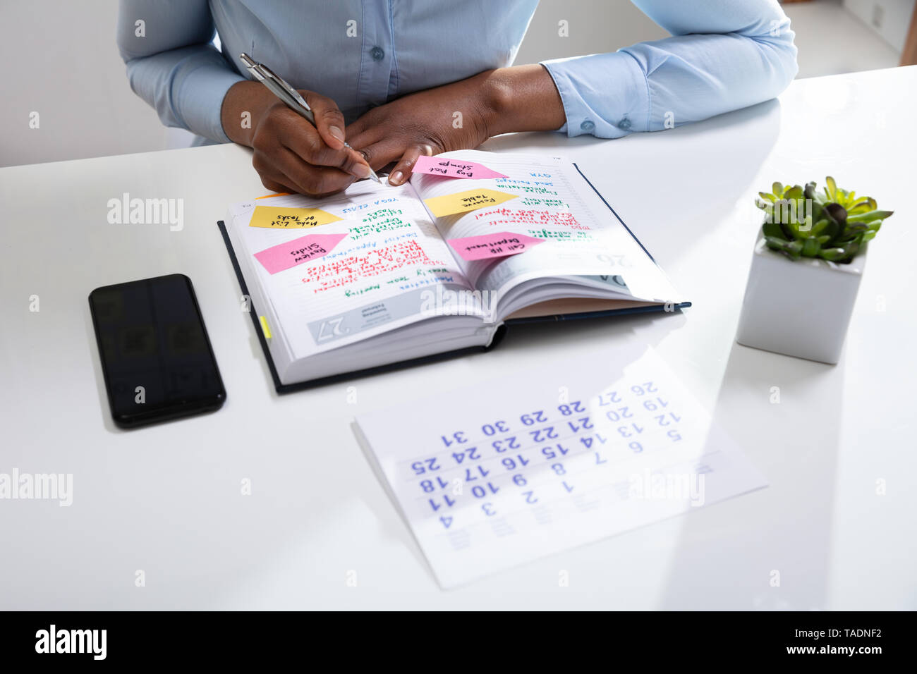 Calendar checking hi-res stock photography and images - Alamy