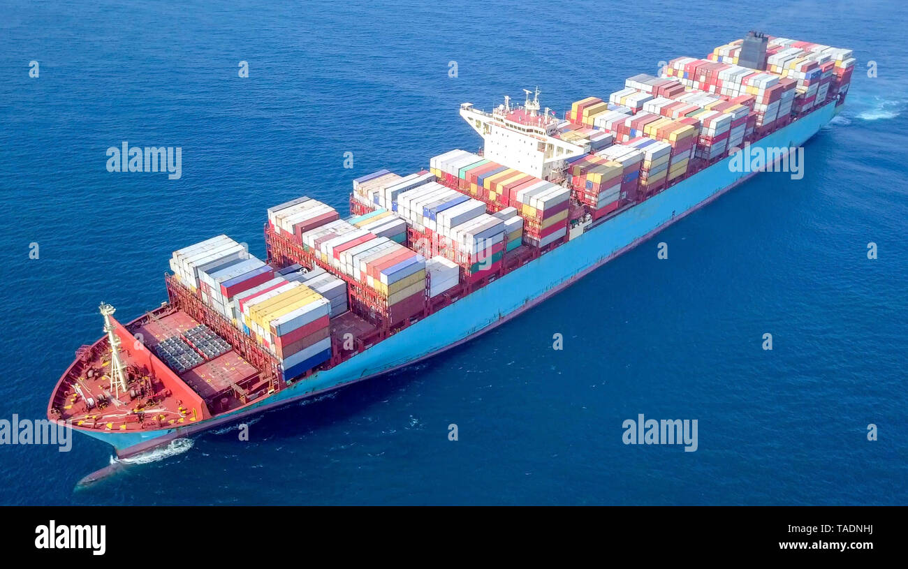 Aerial footage of an Ultra large container vessel (ULCV) cruising in ...