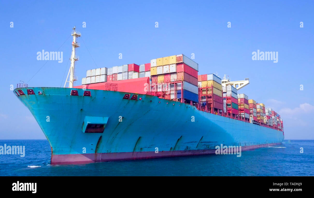 Aerial footage of an Ultra large container vessel (ULCV) cruising in ...