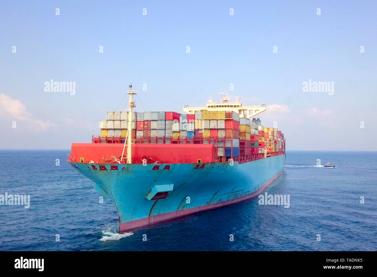 Aerial footage of an Ultra large container vessel (ULCV) cruising in ...