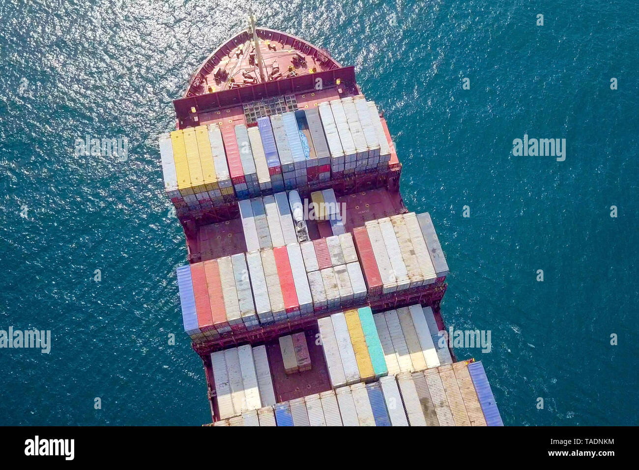 Aerial footage of an Ultra large container vessel (ULCV) cruising in ...