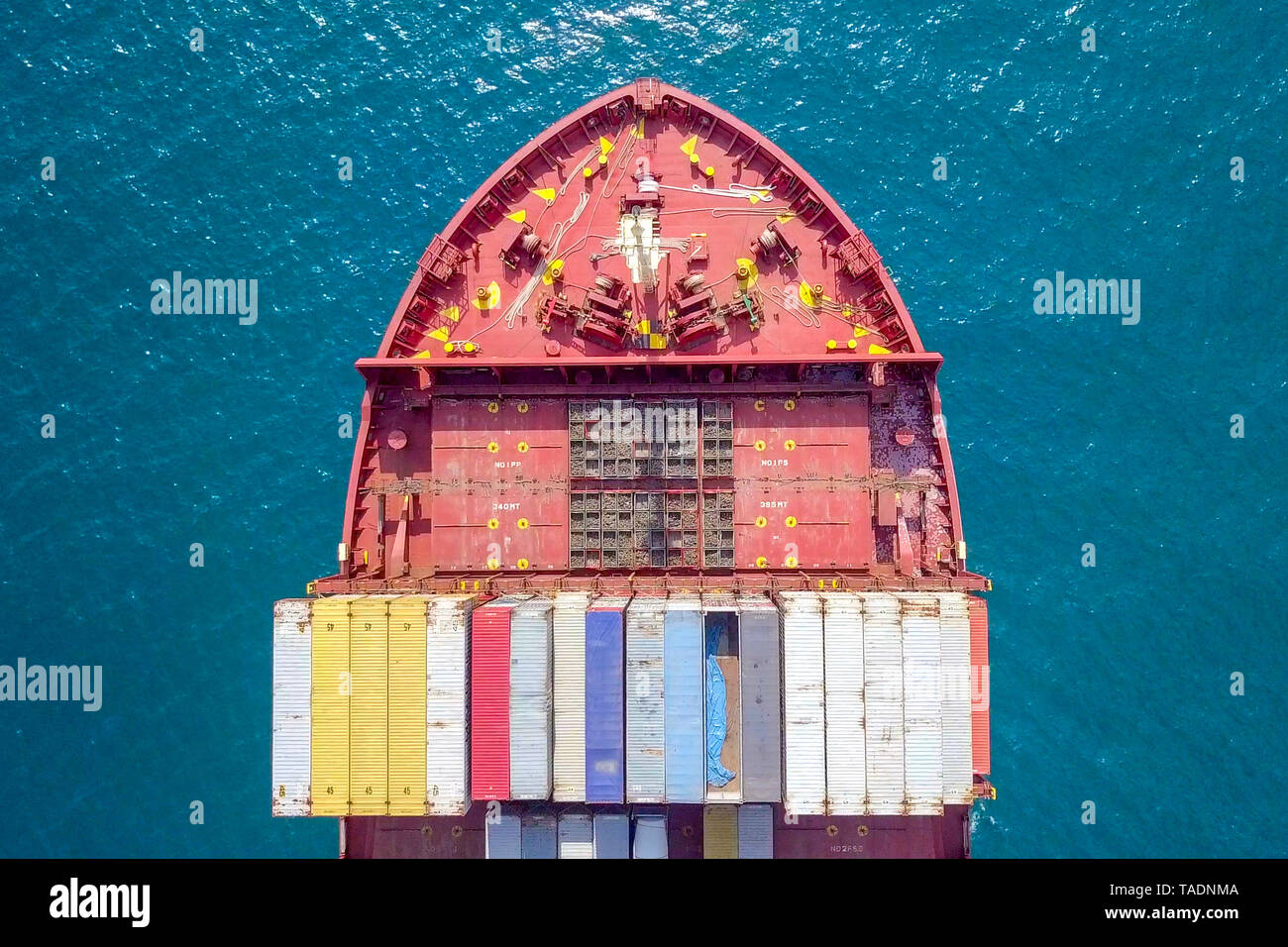 Aerial footage of an Ultra large container vessel (ULCV) cruising in ...