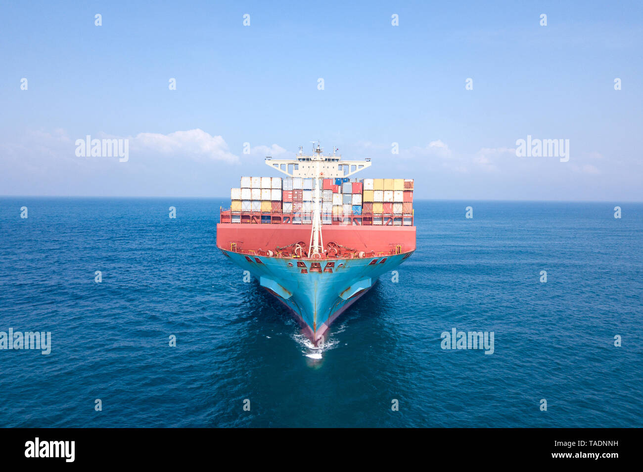Aerial footage of an Ultra large container vessel (ULCV) cruising in ...