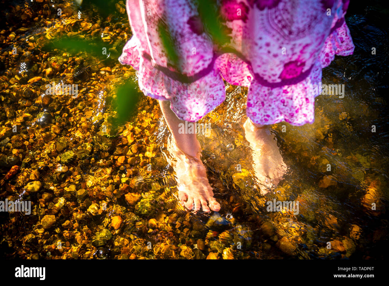 Child feet in water hi-res stock photography and images - Alamy