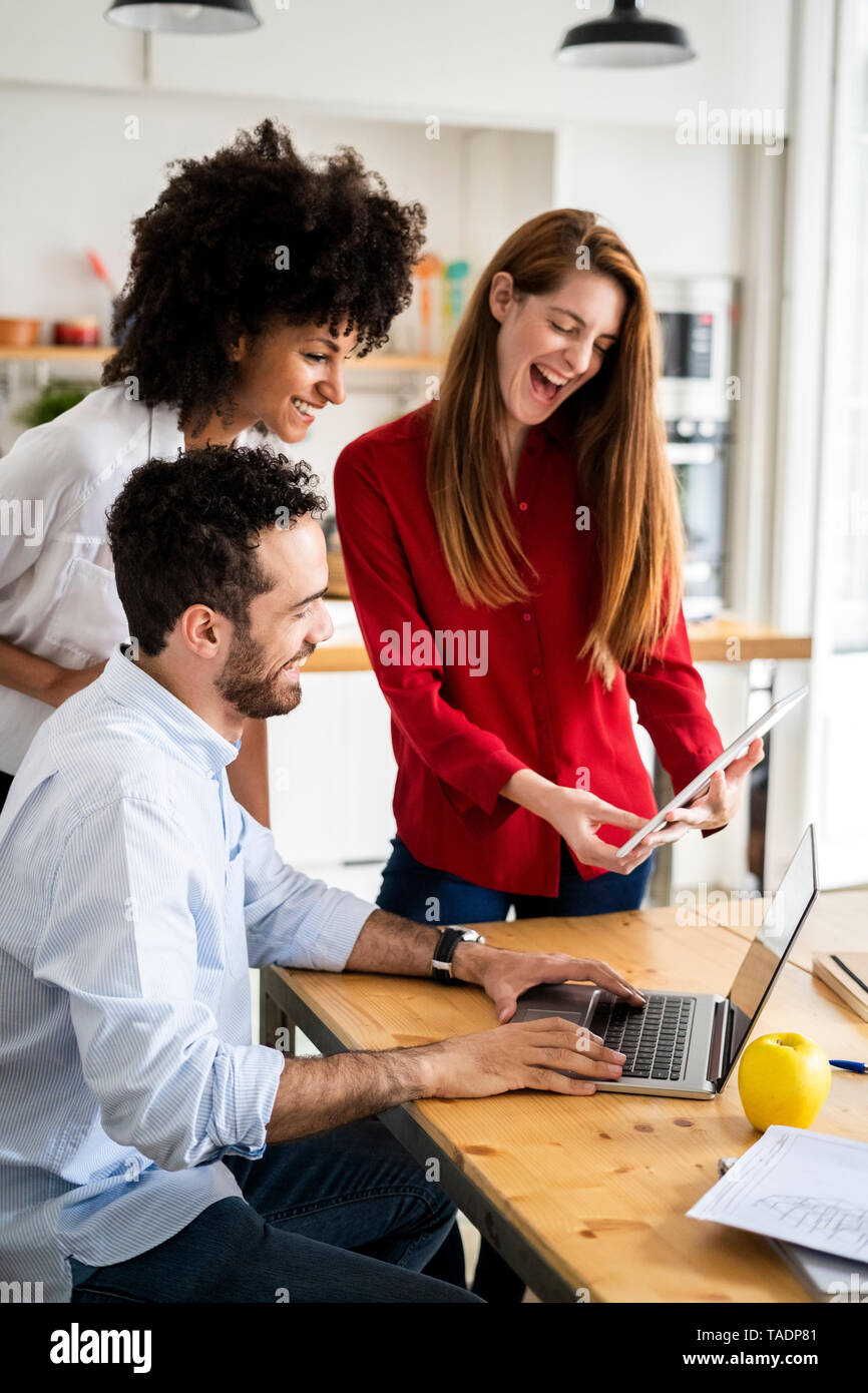 Professional working with friends hi-res stock photography and images ...