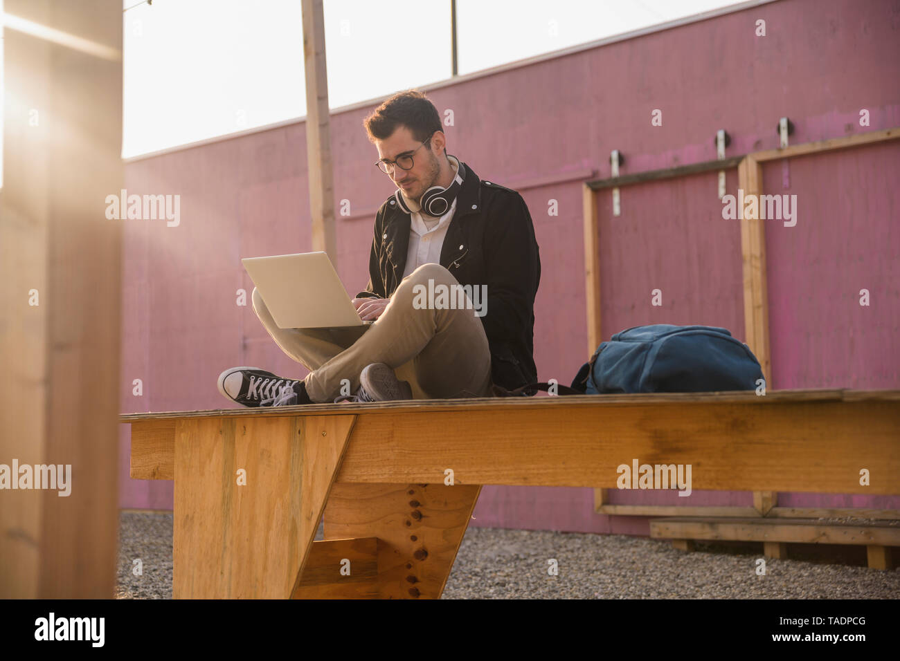 Young people sitting on platform hi-res stock photography and images ...