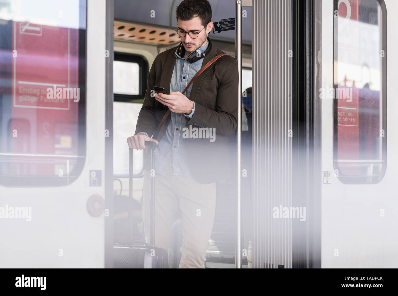 Commuter train inside hi-res stock photography and images - Alamy