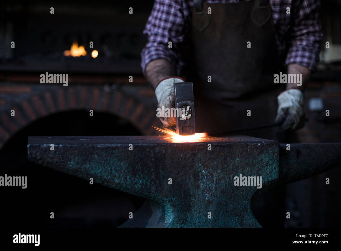 Blacksmith working at the anvil hi-res stock photography and images - Alamy