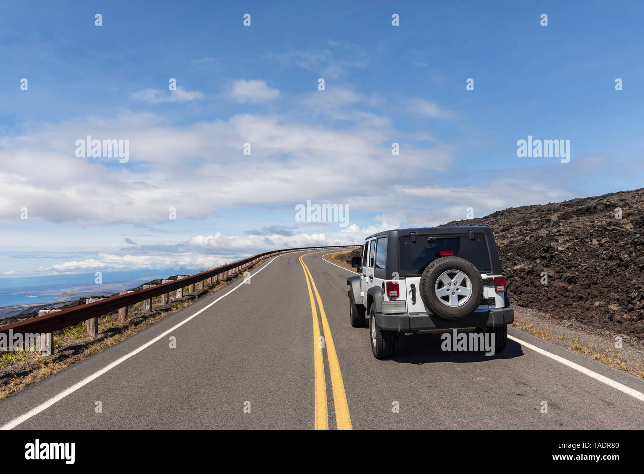 USA, Hawaii, Volcanoes National Park, lava fields, off-road vehicle on ...