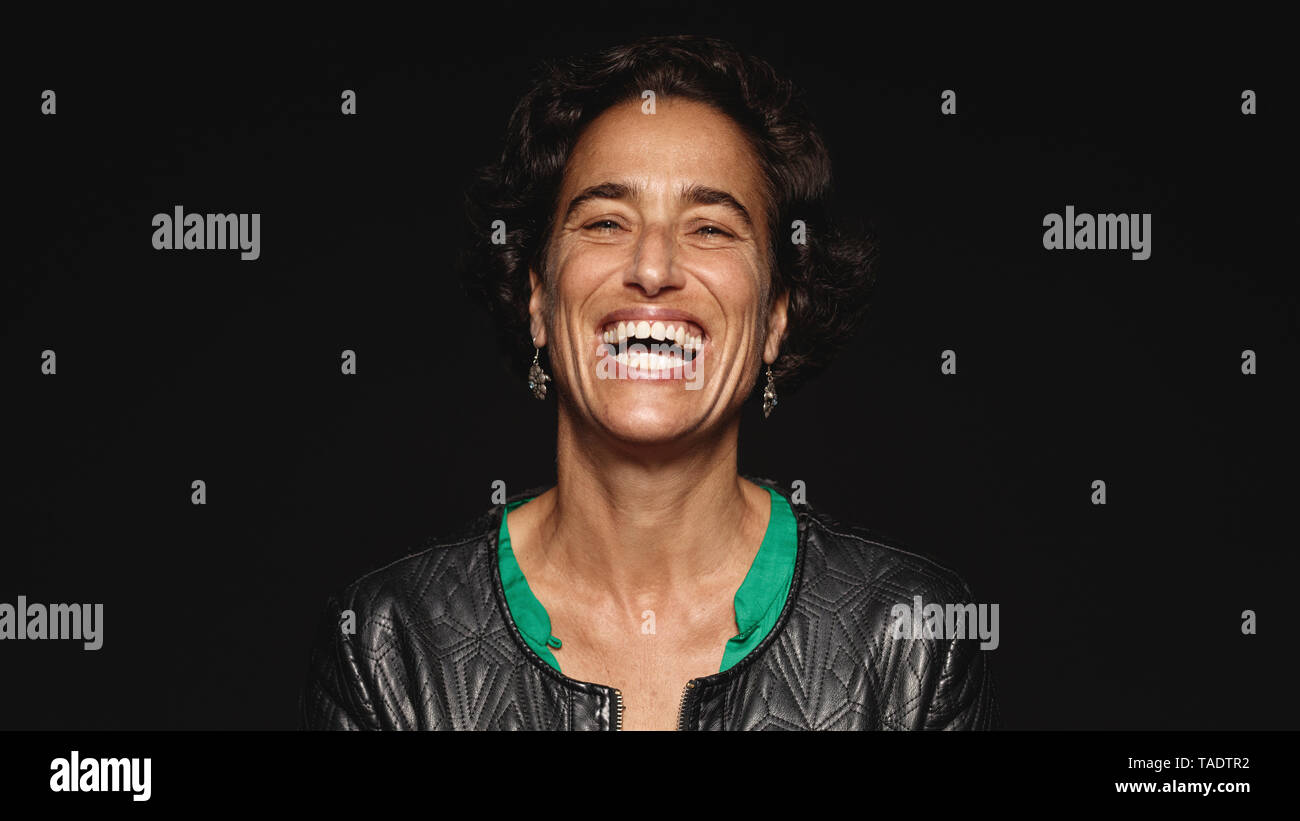 Middle aged woman laughing joyful hi-res stock photography and images ...