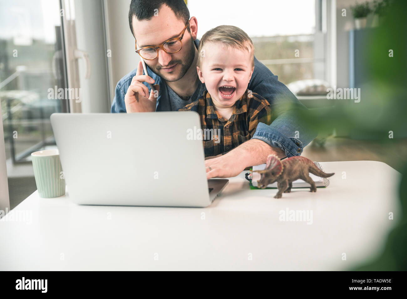 Father and son in office hi-res stock photography and images - Alamy
