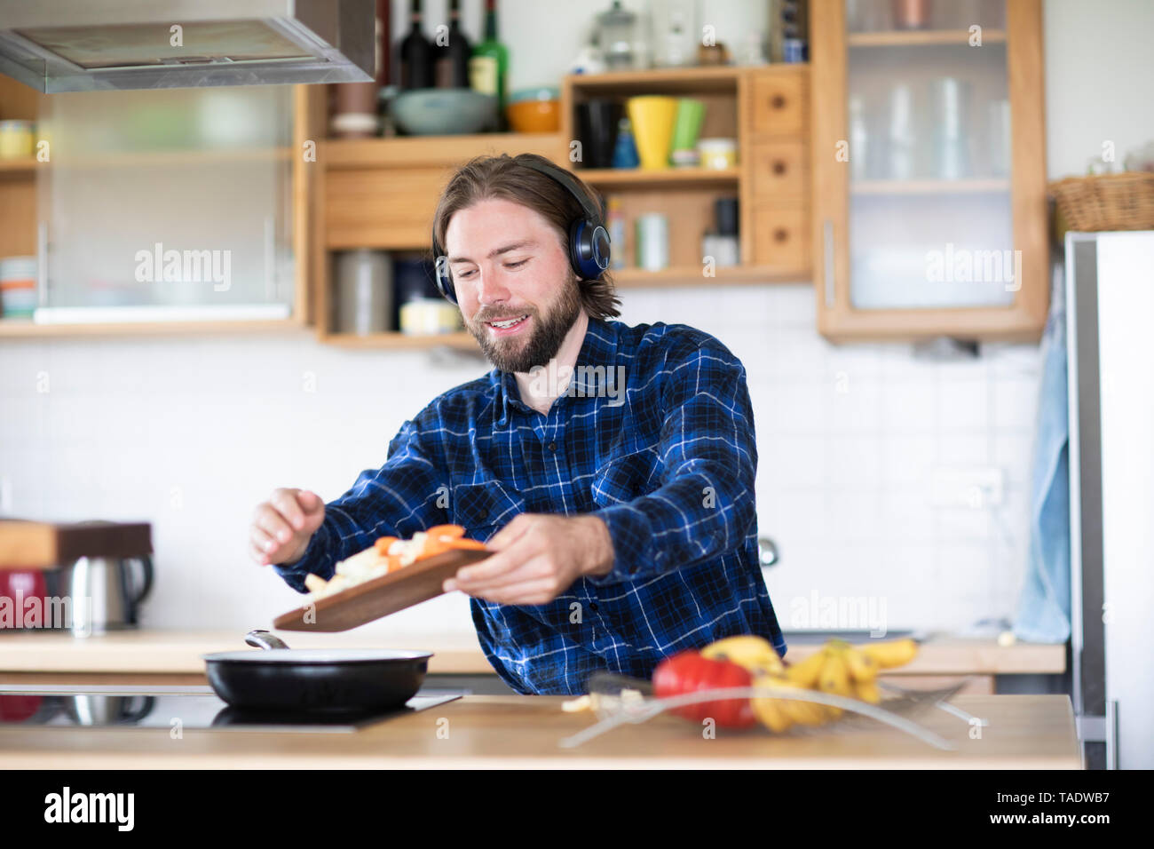 Germany young man in kitchen hi-res stock photography and images - Alamy