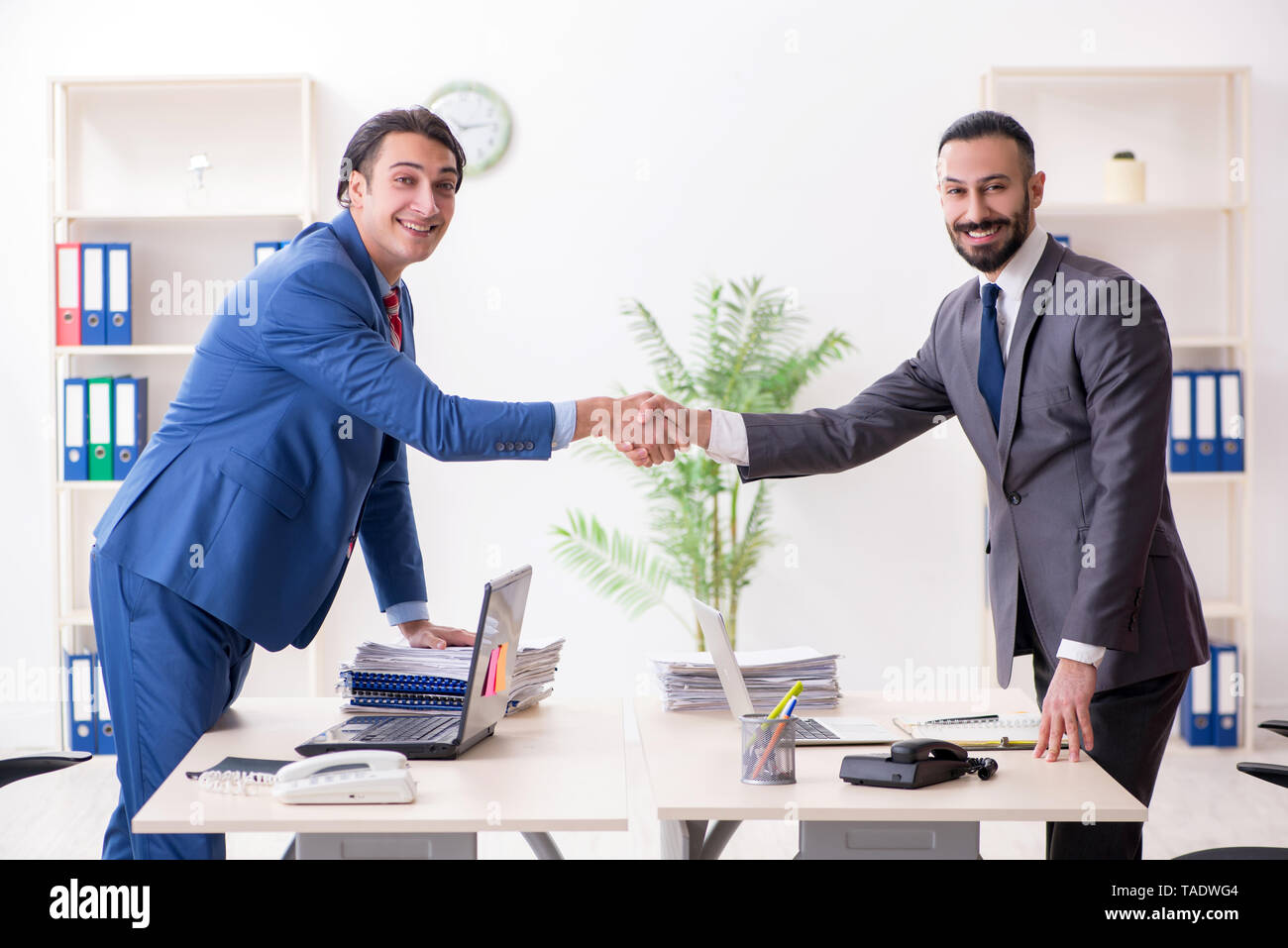 Two male colleagues in the office Stock Photo - Alamy