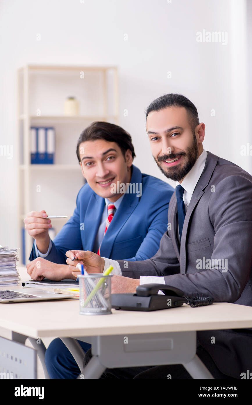 Two male colleagues in the office Stock Photo - Alamy