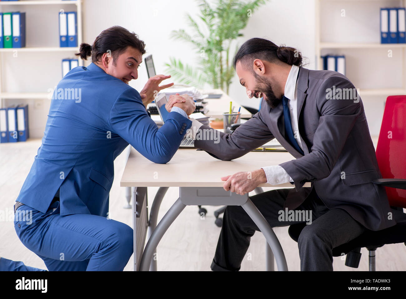 Two male colleagues in the office Stock Photo - Alamy
