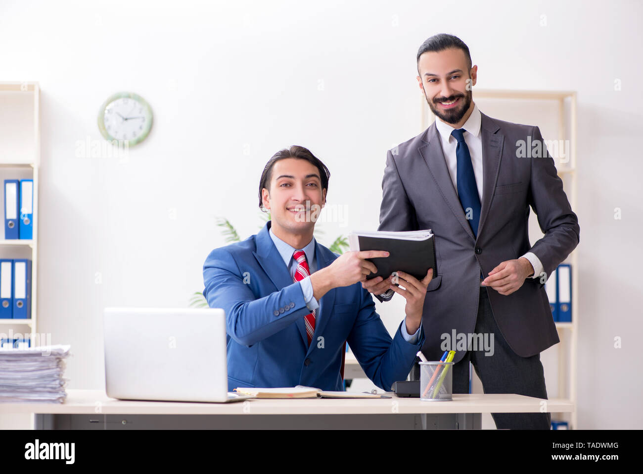 Two male colleagues in the office Stock Photo - Alamy