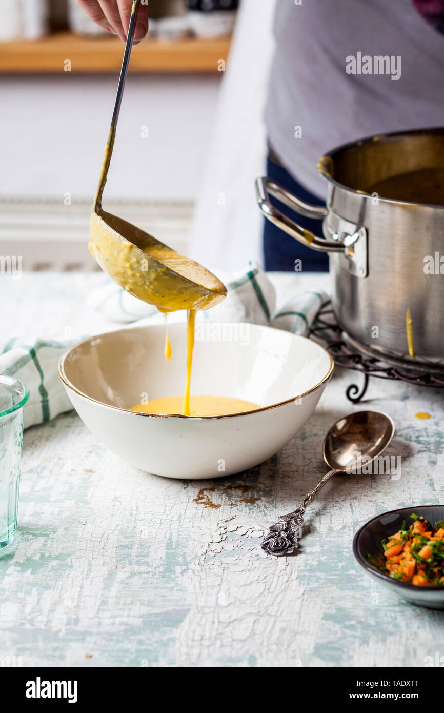 Soup Ladle Pouring Soup