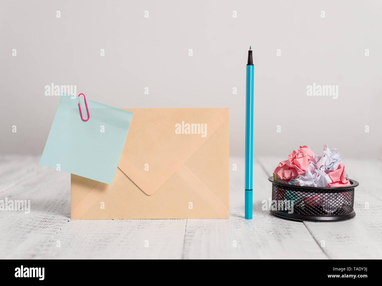 Envelope sticky note clip marker paper balls container wooden ...