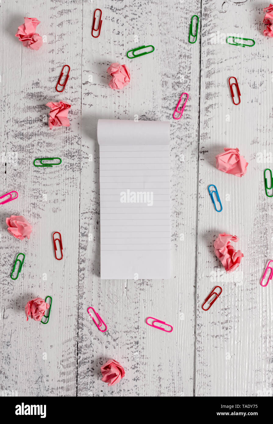 Stripped ruled notepad clips paper balls lying wooden vintage ...