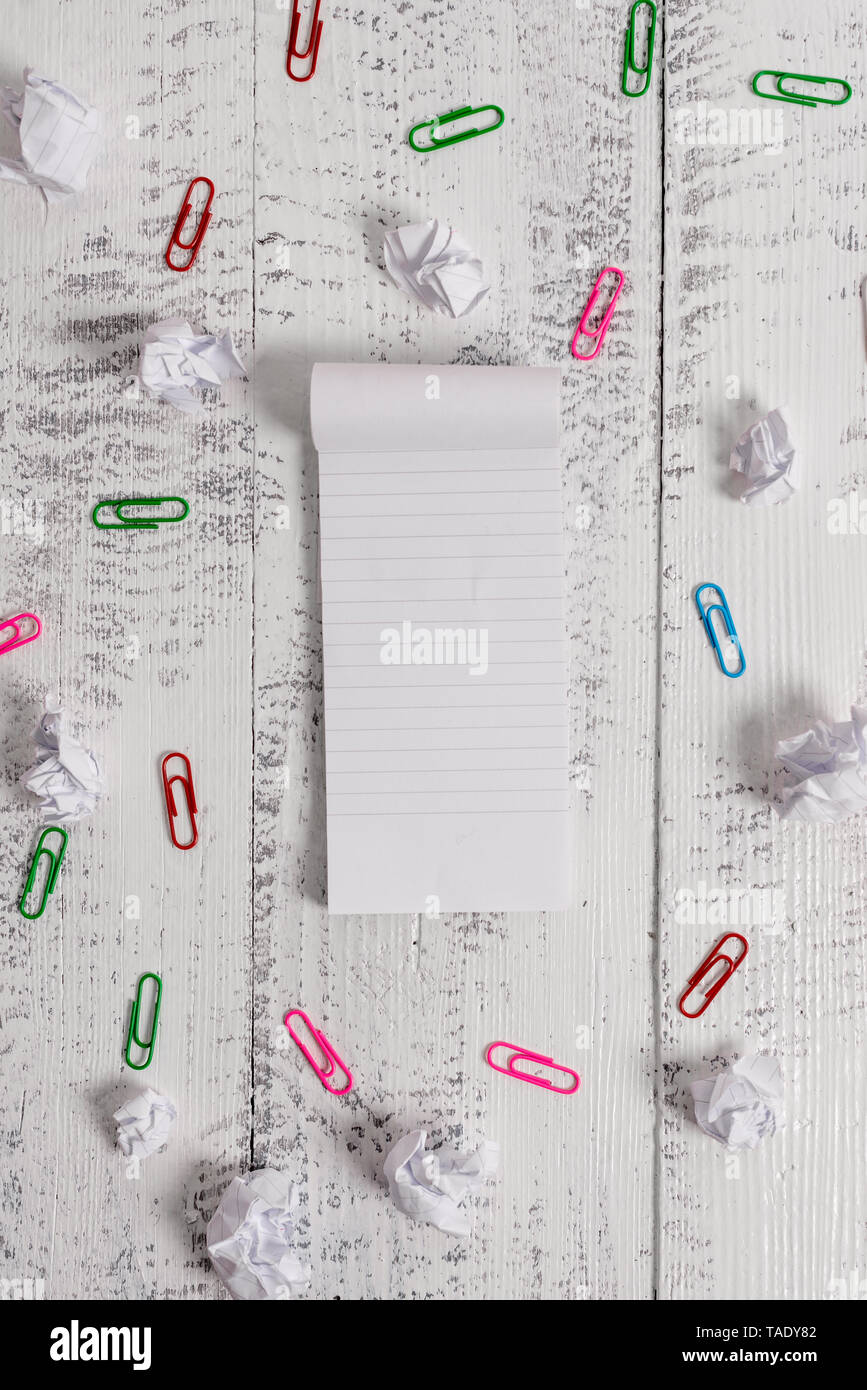 Stripped ruled notepad clips paper balls lying wooden vintage ...