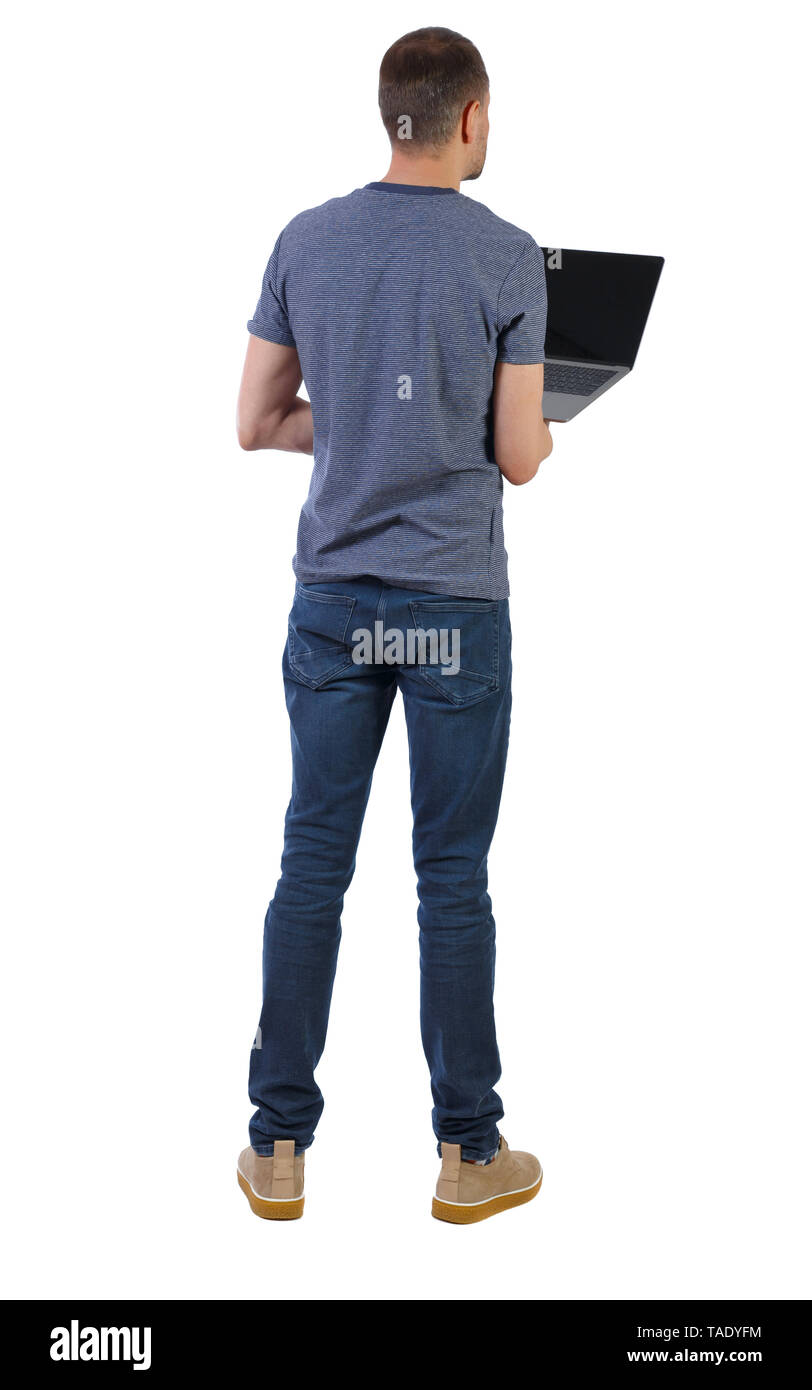 Back view of a man who is standing with a laptop. Rear view people ...