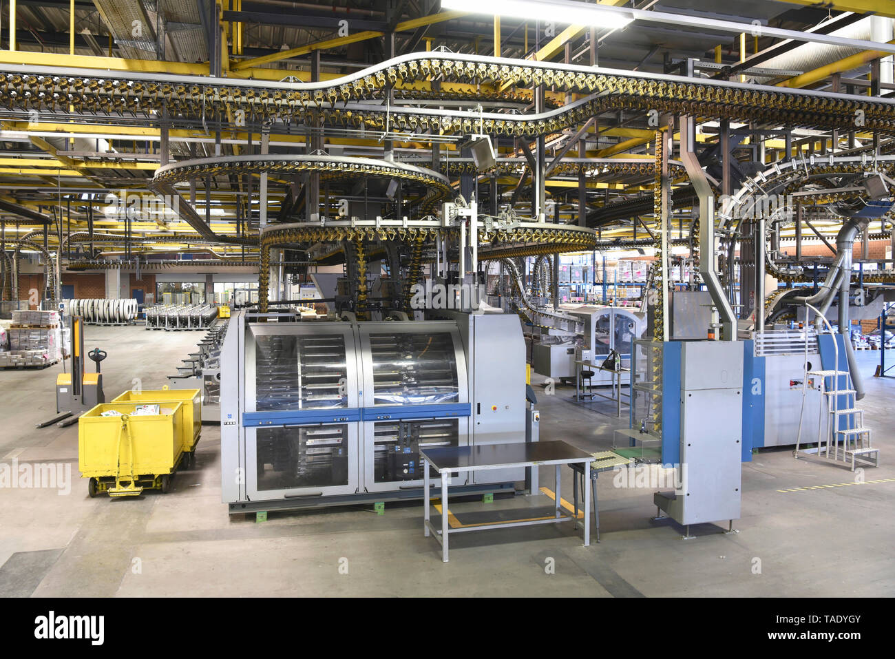 Machines for transport and sorting plant in a printing shop Stock Photo ...