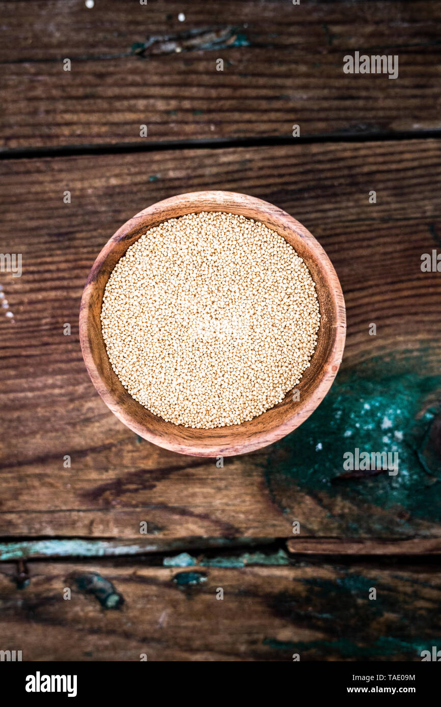 Amaranth grains in wooden hi-res stock photography and images - Alamy