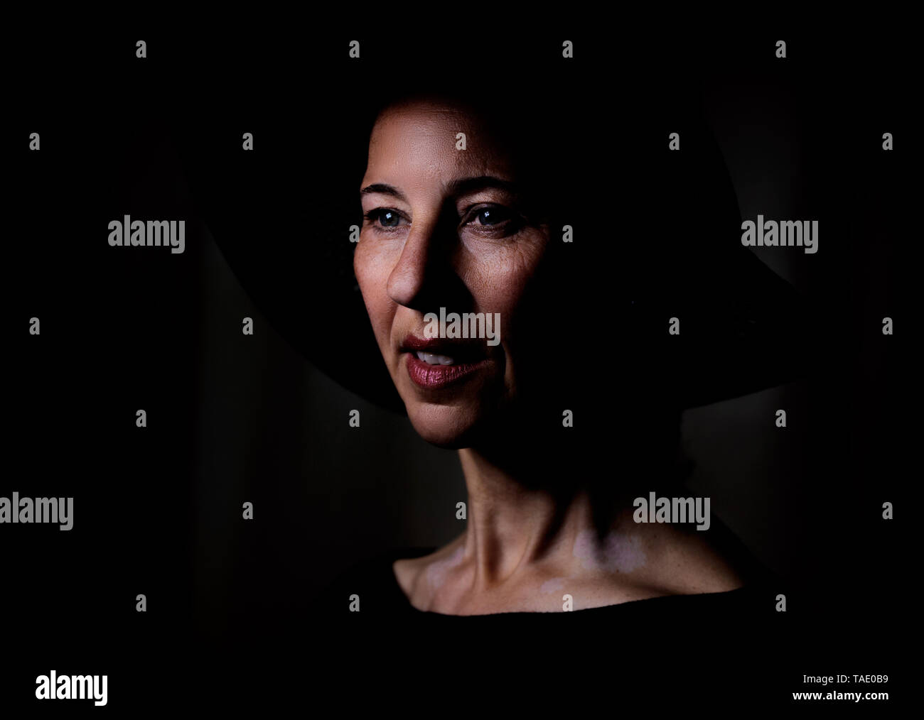 lady in the shadow II Stock Photo - Alamy