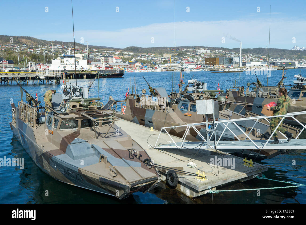 Members of the Norwegian Coastal Ranger Commando (KJK) prepare the CB90 ...