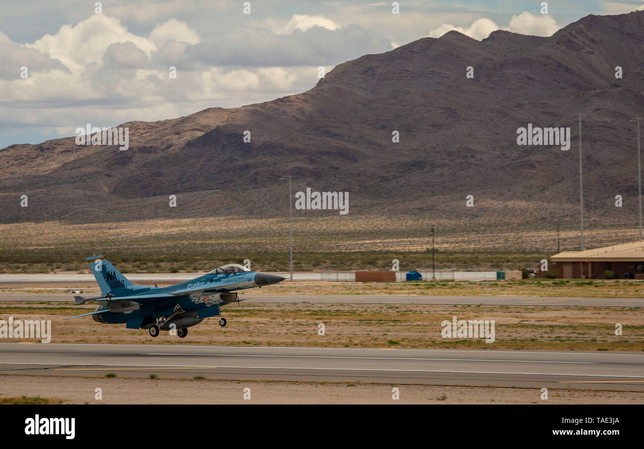 The newly painted F-16 Fighting Falcon takes off for its first flight ...