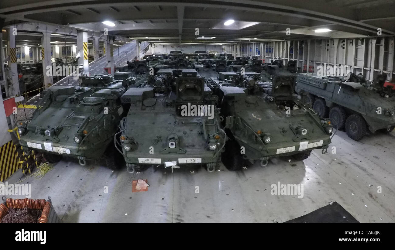 Strykers from the 56th Stryker Brigade Combat Team, wait to be off ...