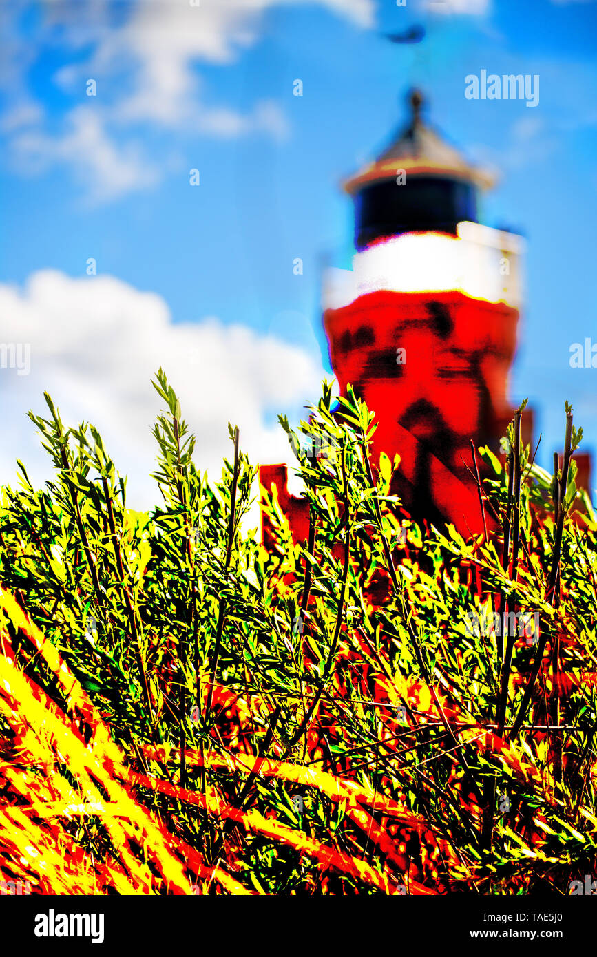 lighthouse with green plants and blue sky with clouds Stock Photo - Alamy