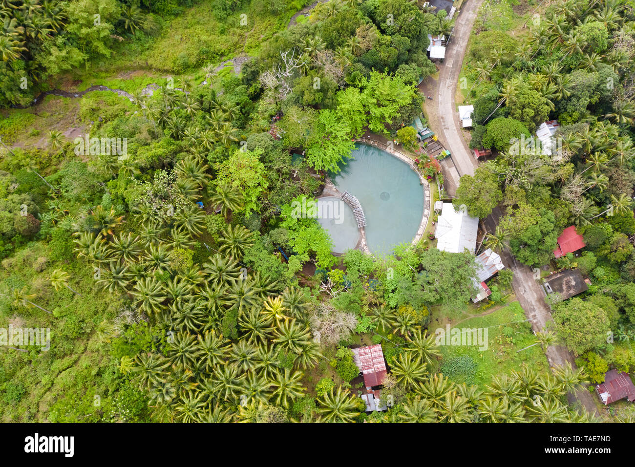 Soda Swimming Pool. Swimming pool in tropical forest on Camigin Island ...
