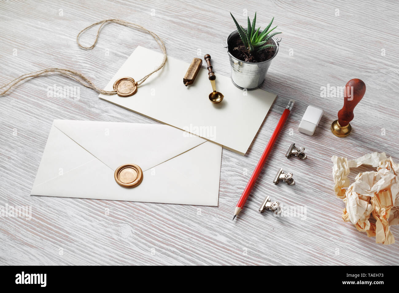 Old blank retro stationery on light wooden background Stock Photo - Alamy