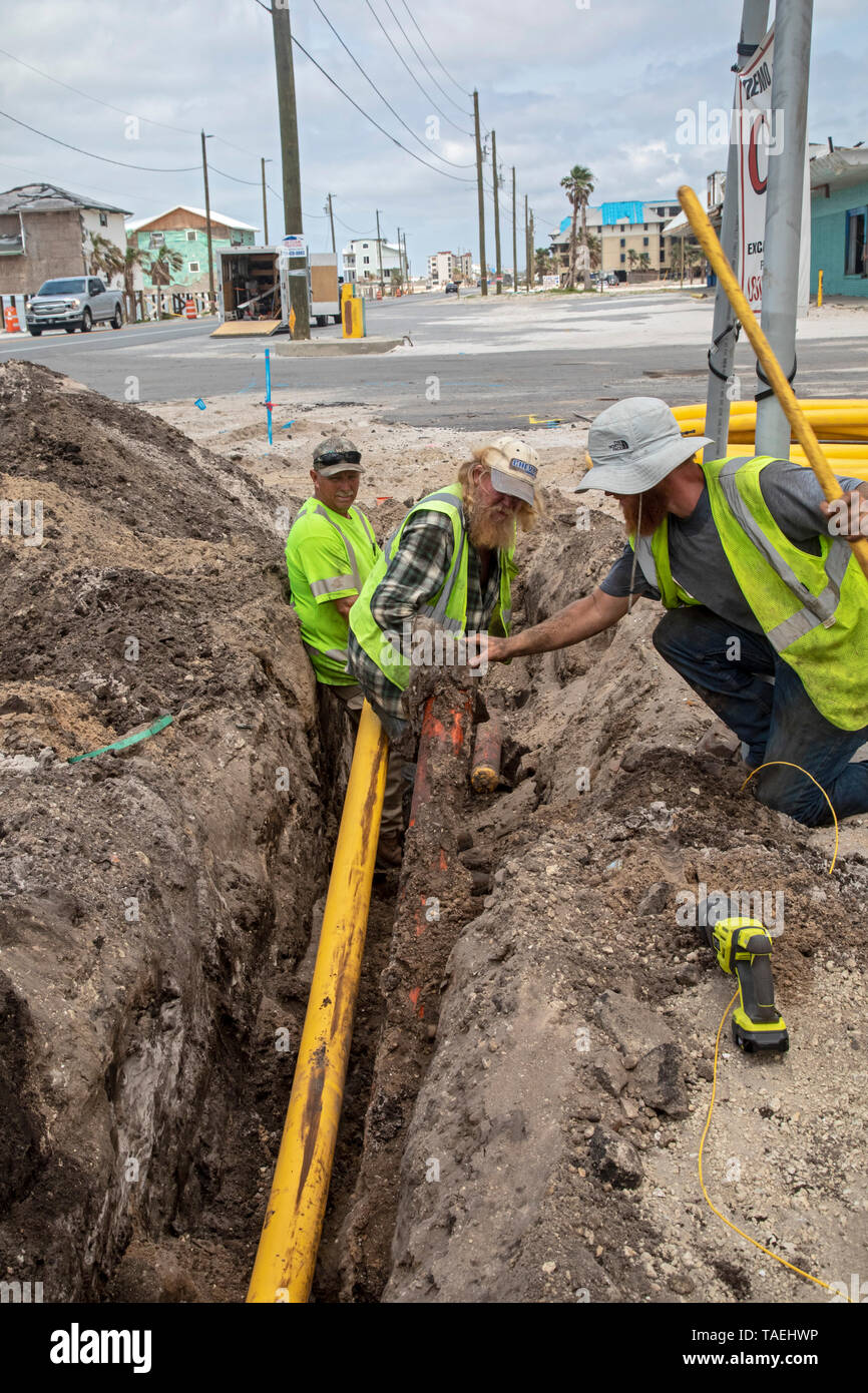 Mexico Beach, Florida - Workers replace a natural gas line seven months ...