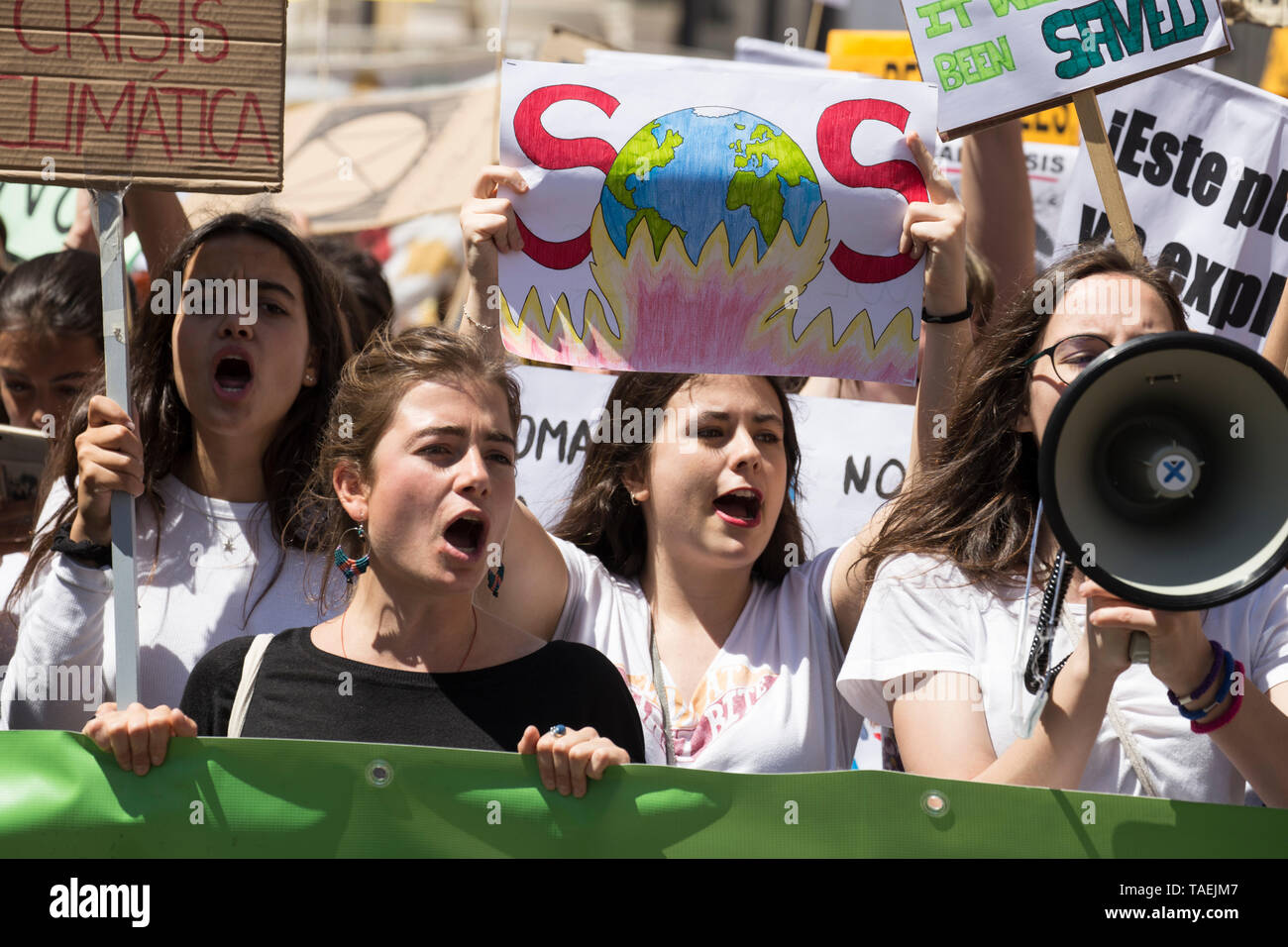 Demonstrators are seen shouting slogans during the protest. Hundreds of ...